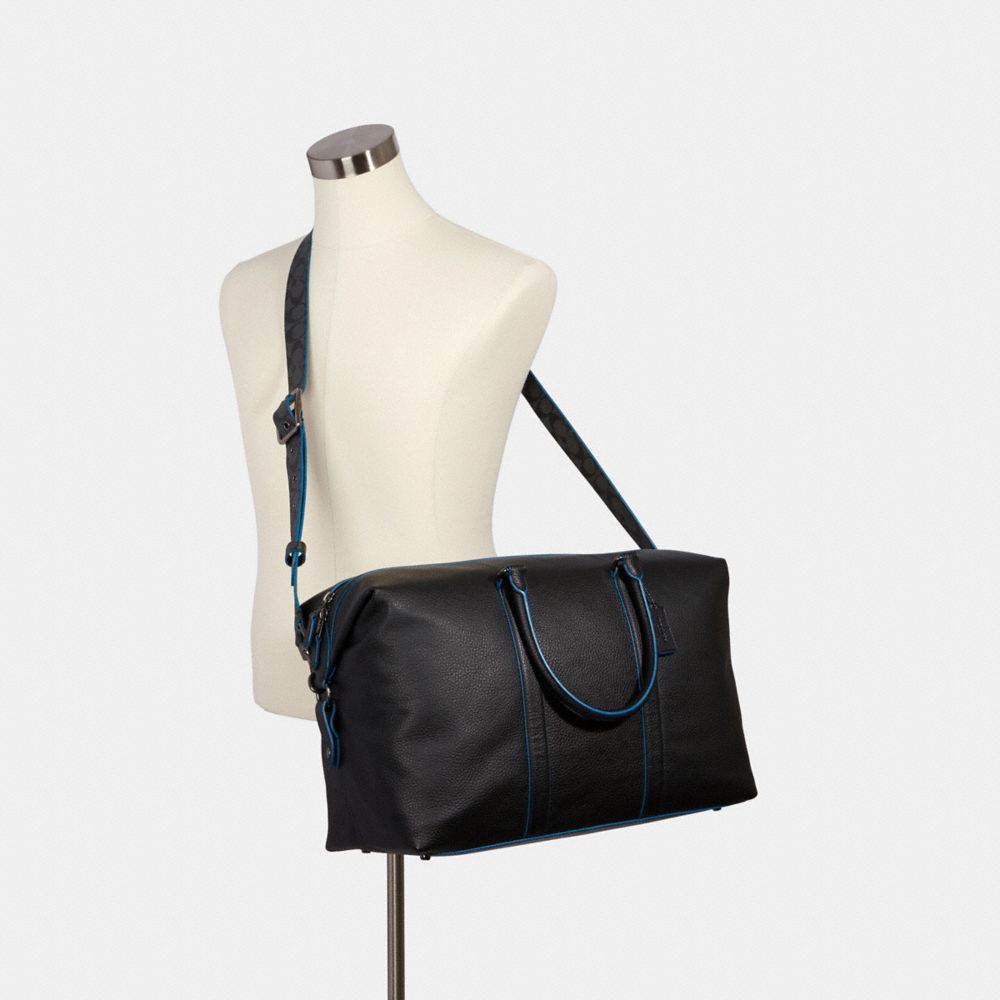 COACH® Outlet | Trekker Bag With Signature Canvas Strap