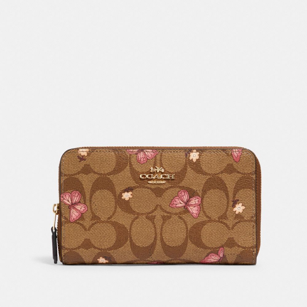 COACH® Outlet | Medium Id Zip Wallet In Signature Canvas With Butterfly ...