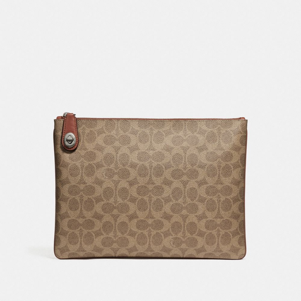 COACH® | Pouch In Signature Canvas