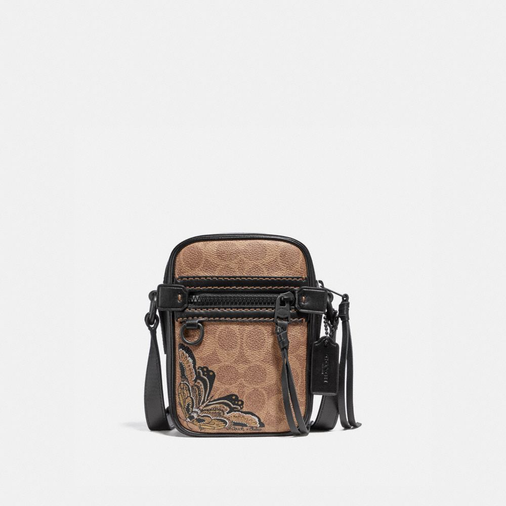 Dylan 10 In Signature Canvas With Tattoo | COACH®
