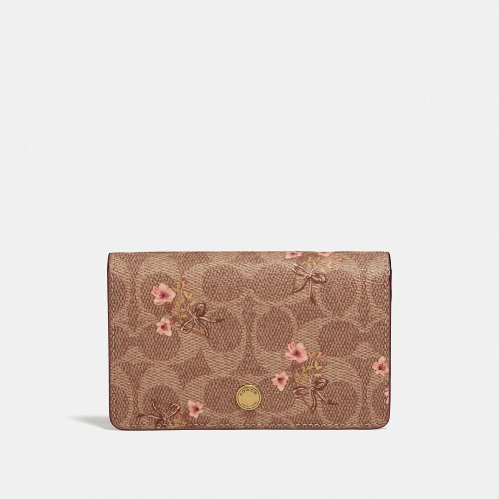 Foldover Card Case In Signature Canvas With Floral Bow Print | COACH®