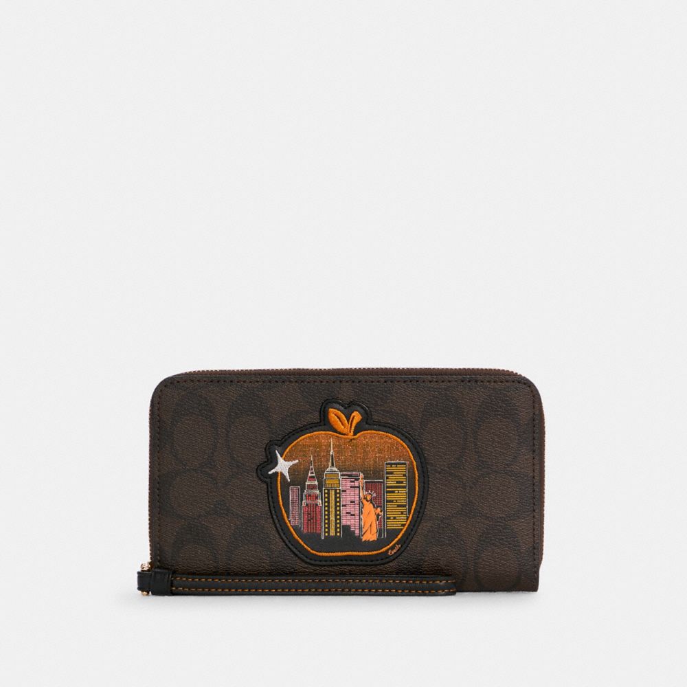 COACH® | Dempsey Large Phone Wallet In Signature Canvas With Souvenir ...