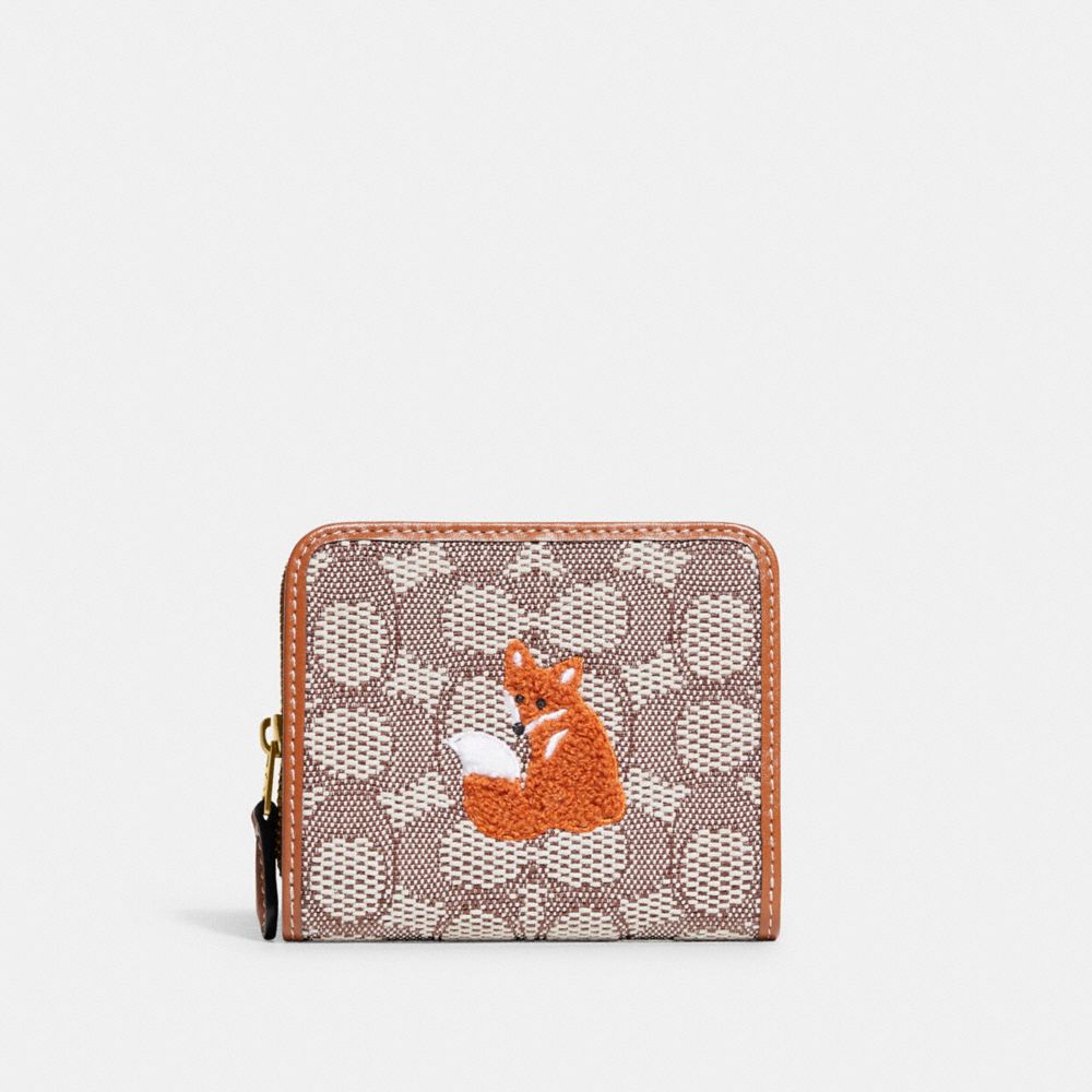 COACH® | Billfold Wallet In Signature Textile Jacquard With Fox Motif
