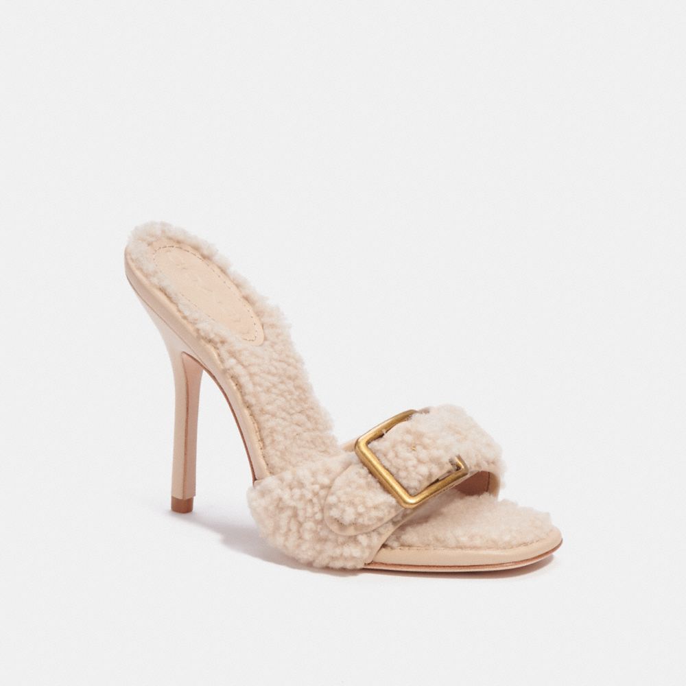 COACH® | Shearling Buckle Mule