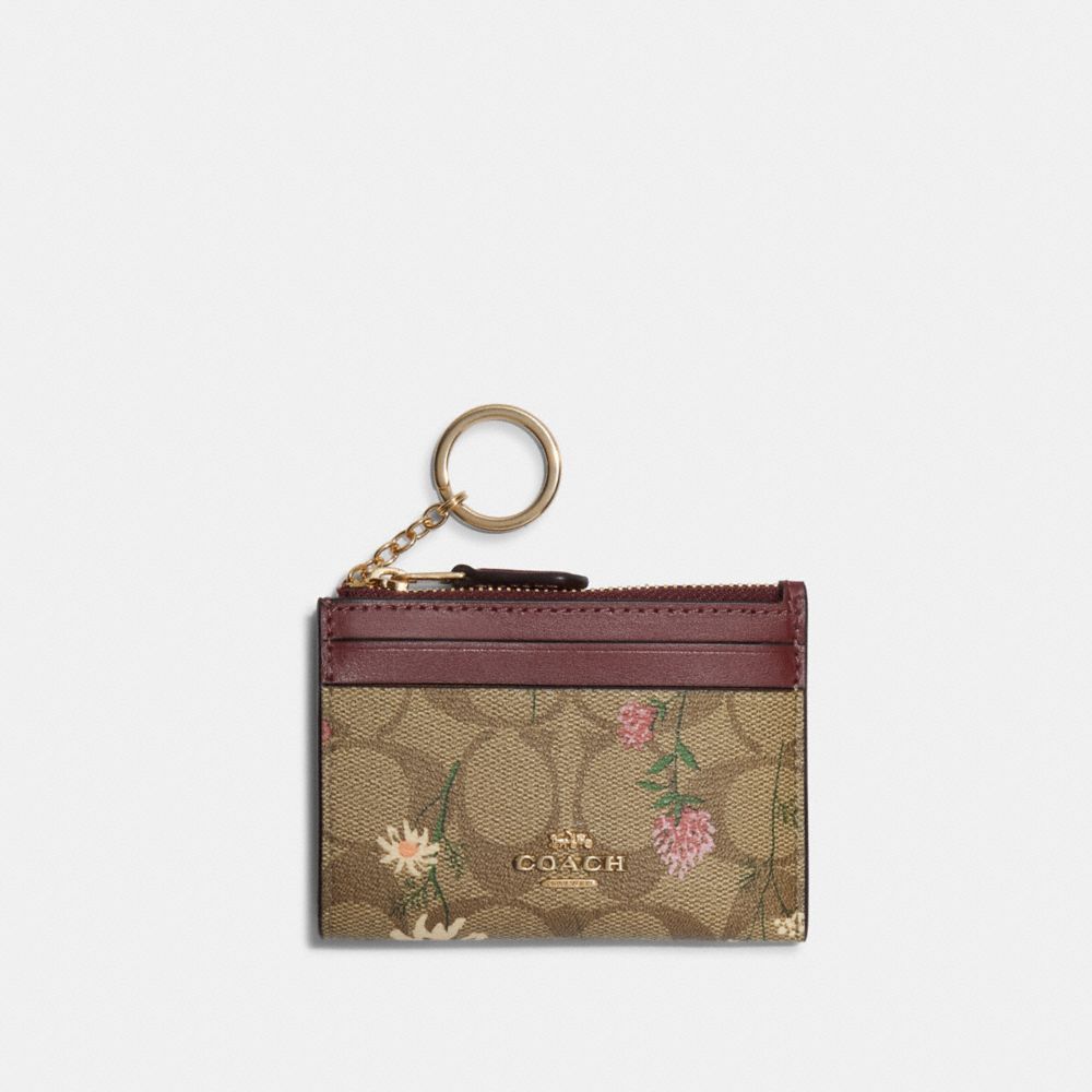 COACH OUTLET® | Mini Skinny Id Case In Signature Canvas With Wildflower ...