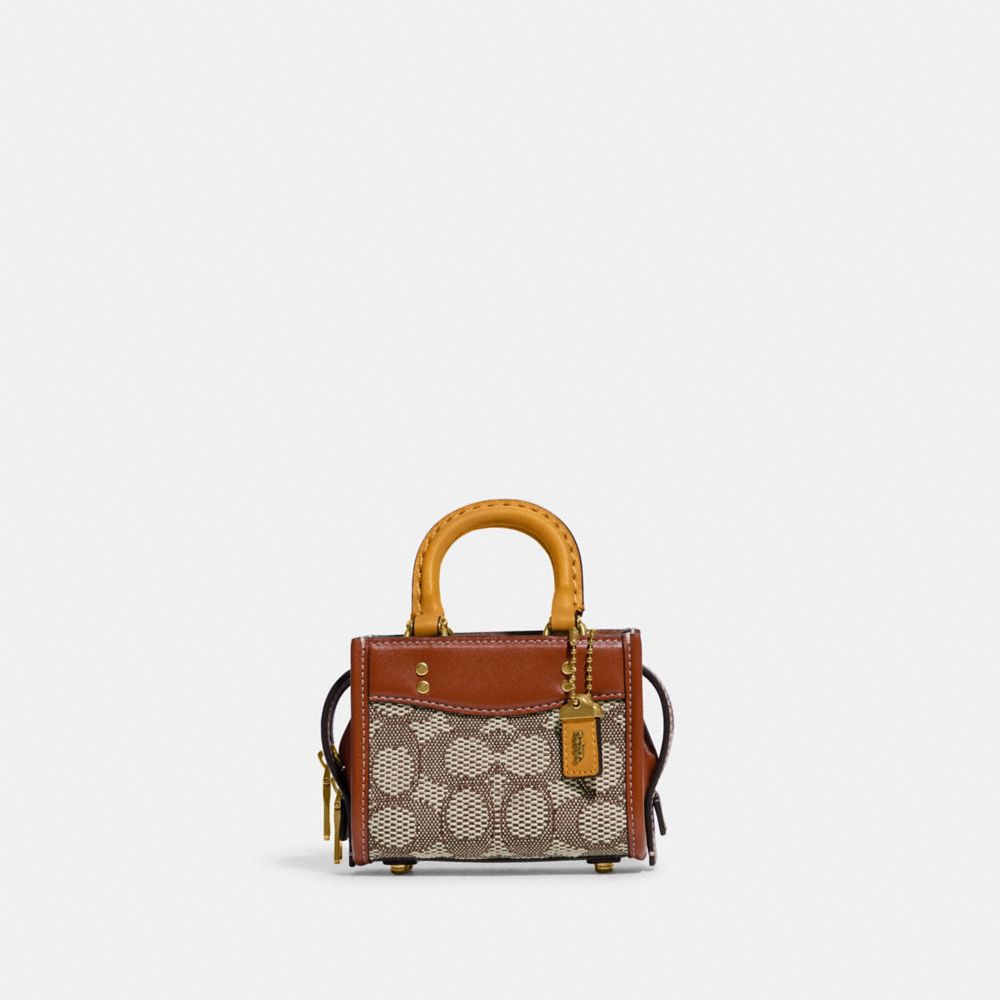 Coach Rogue 12 In Signature Textile Jacquard In Brass/cocoa Burnished ...