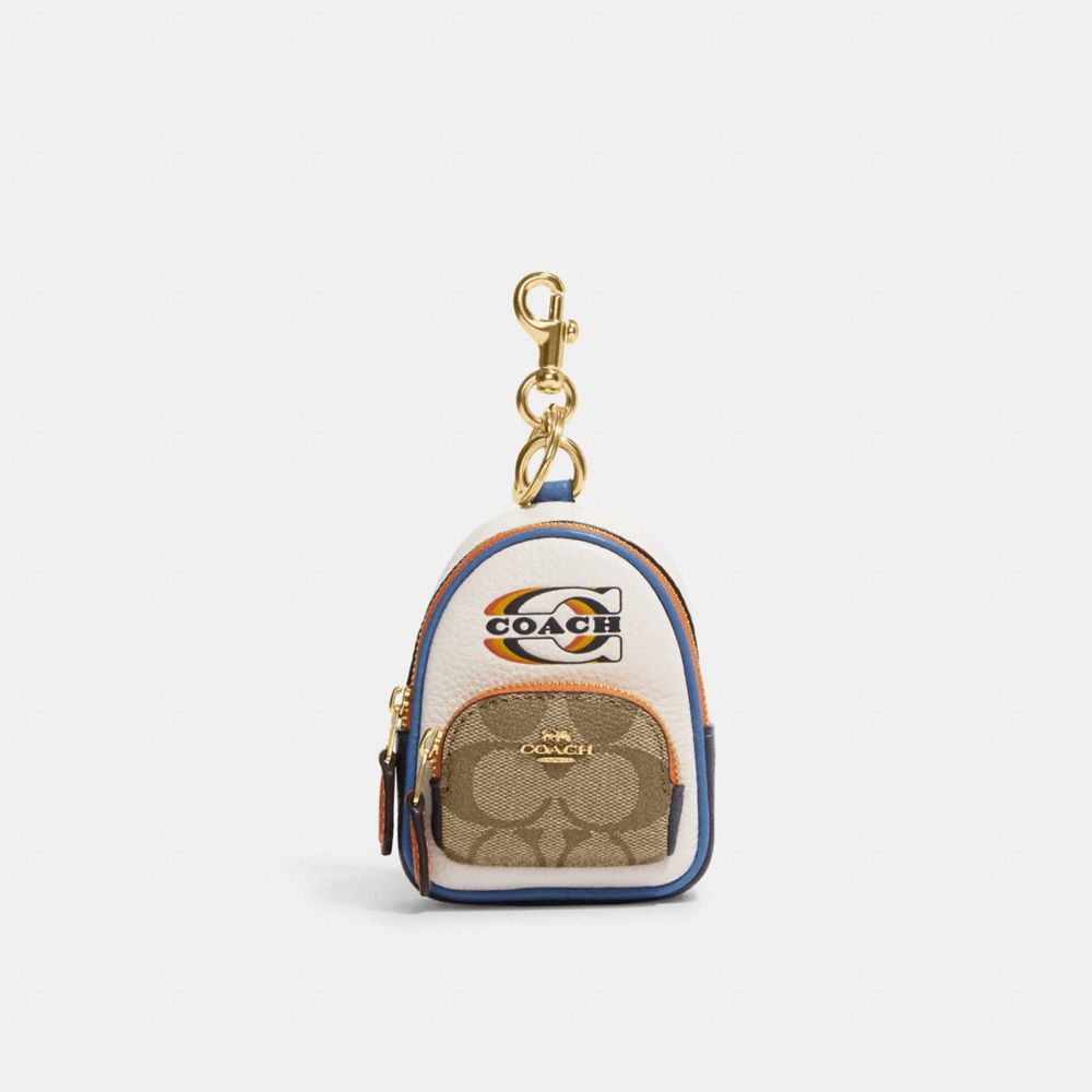 COACH® | Mini Court Backpack Bag Charm In Signature Canvas With Coach Stamp