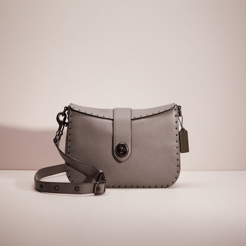 Restored Page 27 With Rivets | COACH®