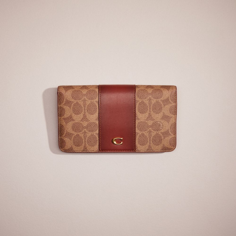 Coach Restored Slim Wallet In Signature Canvas In Brass/tan/rust | ModeSens