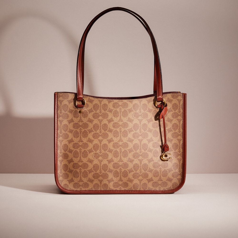 Coach Restored Tyler Carryall In Signature Canvas In Brass/tan/rust ...