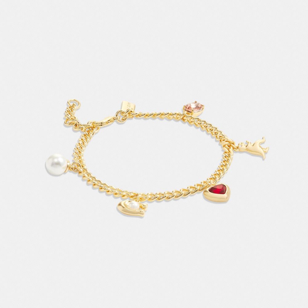 Coach Signature Stone And Heart Charm Bracelet In Gold/red | ModeSens