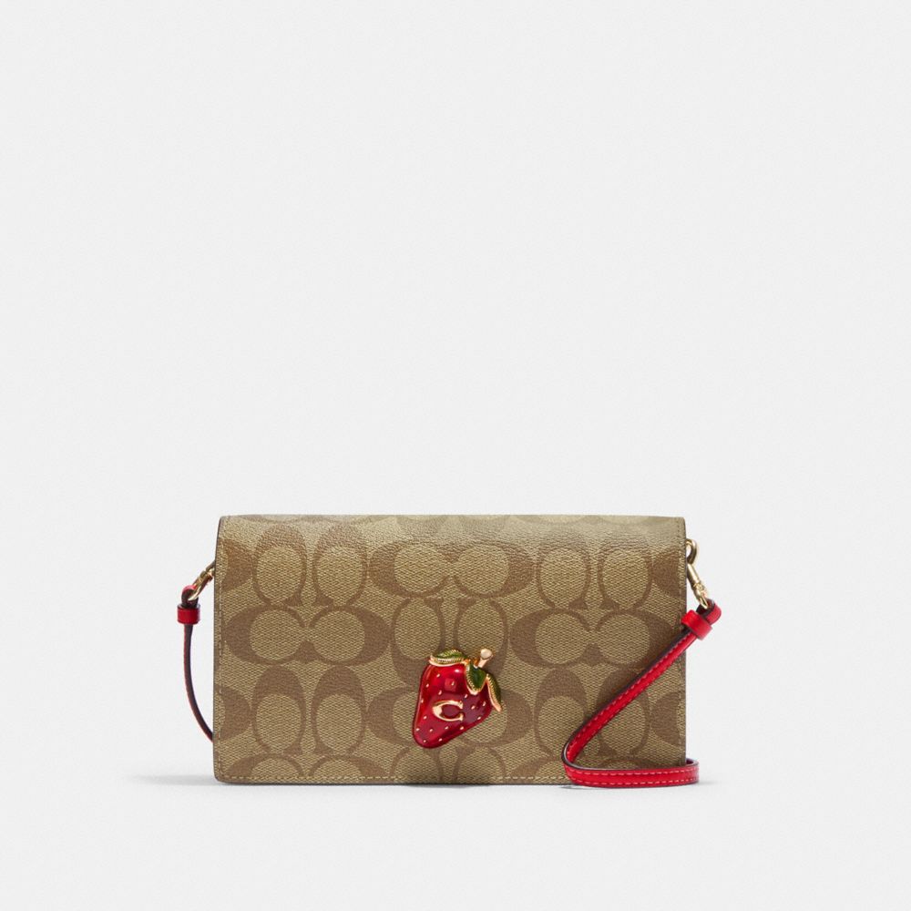 COACH® | Anna Foldover Clutch Crossbody In Signature Canvas With Strawberry