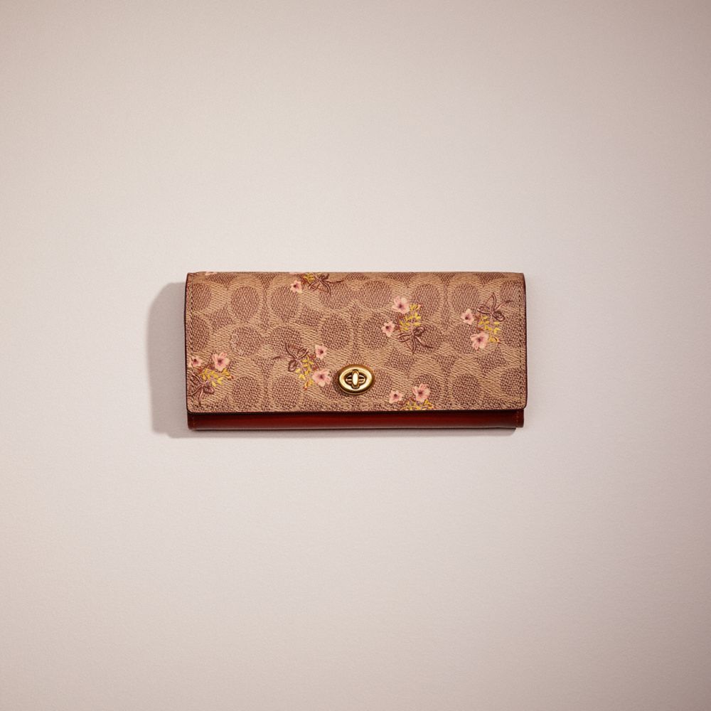 Restored Envelope Wallet In Signature Canvas With Floral Bow Print | COACH®