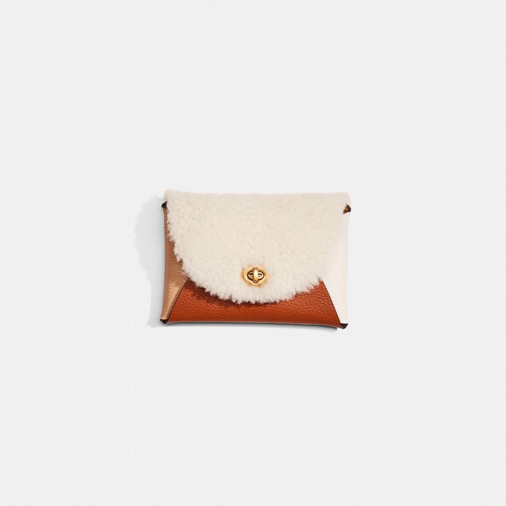 Remade Colorblock Medium Signature Shearling Pouch | COACH®