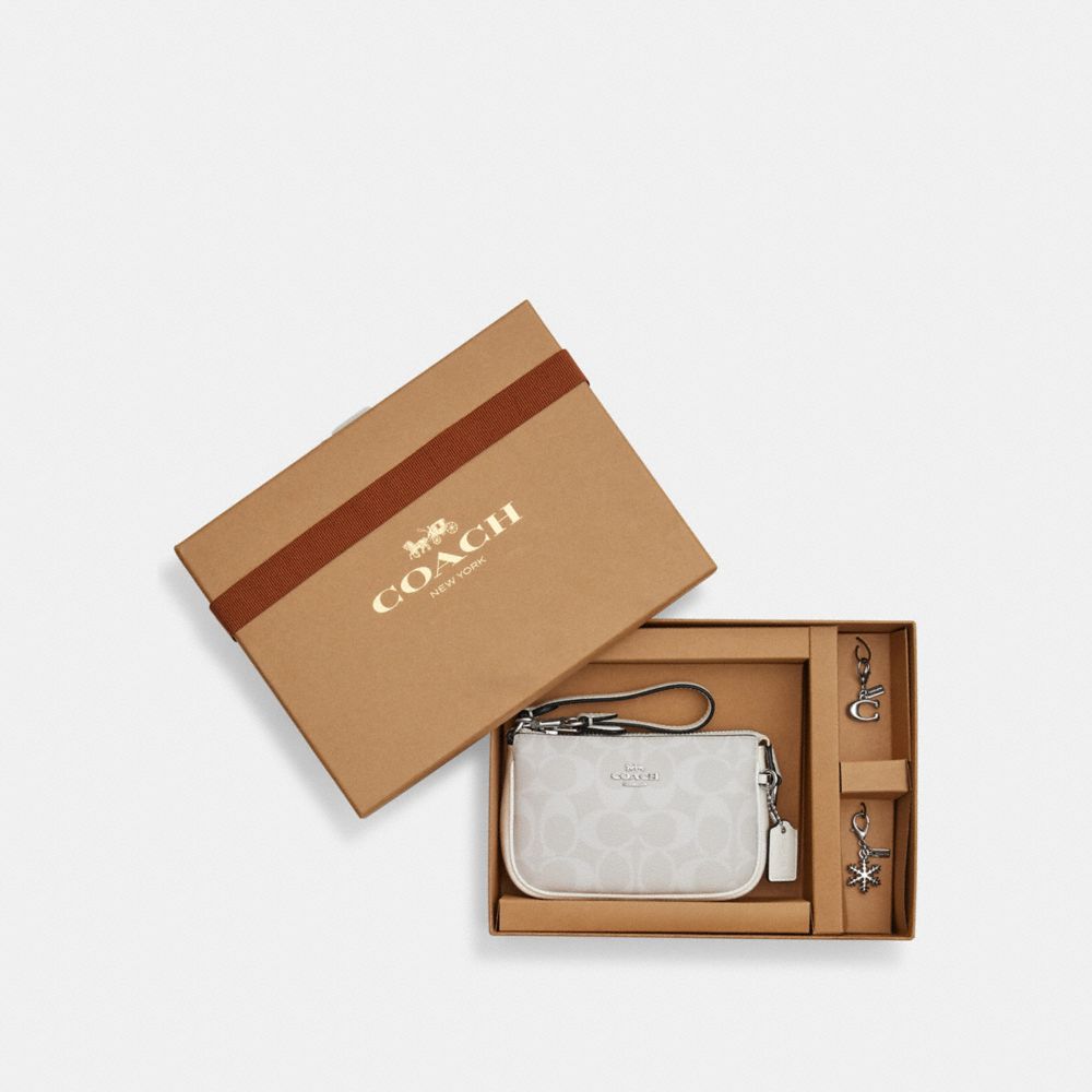 Coach Outlet Boxed Nolita 15 In Signature Canvas In White | ModeSens