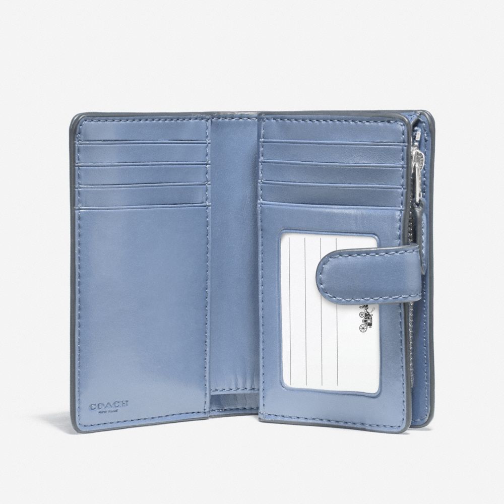 Teal Coach Signature Wallets